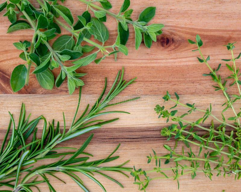 Wooden Board with Fresh Herbs. Top Down View Stock Photo - Image of ...