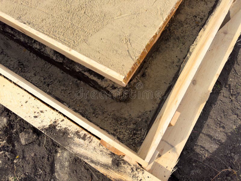 A Wooden Board with a Layer of Cement on Top of it Stock Photo - Image ...