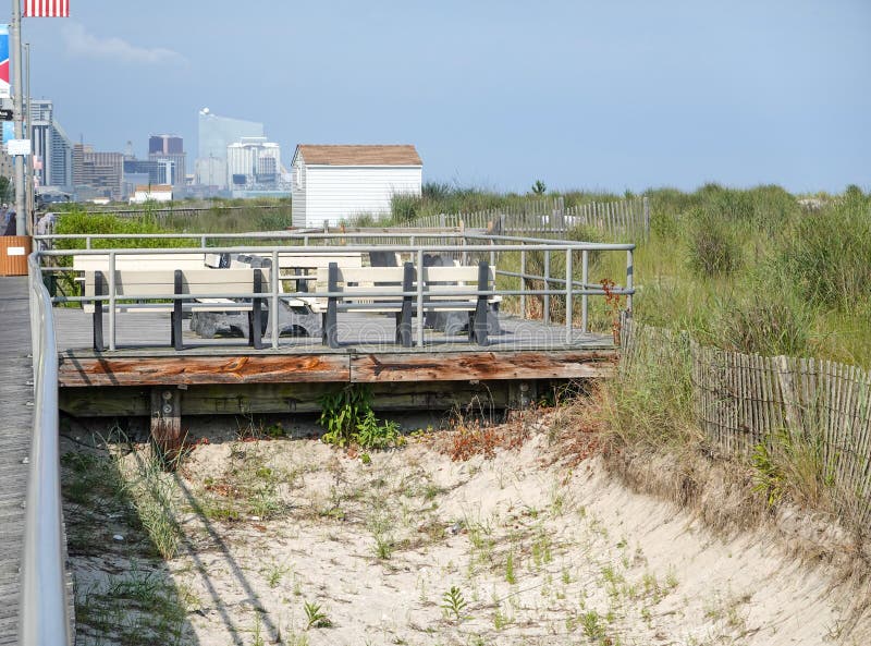 Wooden Boardwalk Extension with Benches by the Beach Stock Image ...