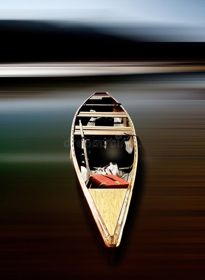 Wooden Boat Floating on Calm Water with Motion Blur Effect Stock Photo ...