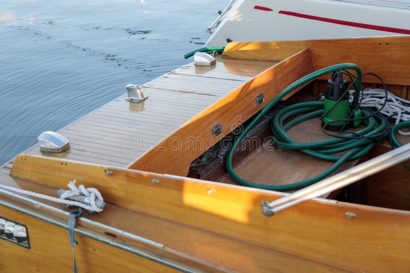Wooden Boat Pumping with Electric Pump Stock Photo - Image of float ...