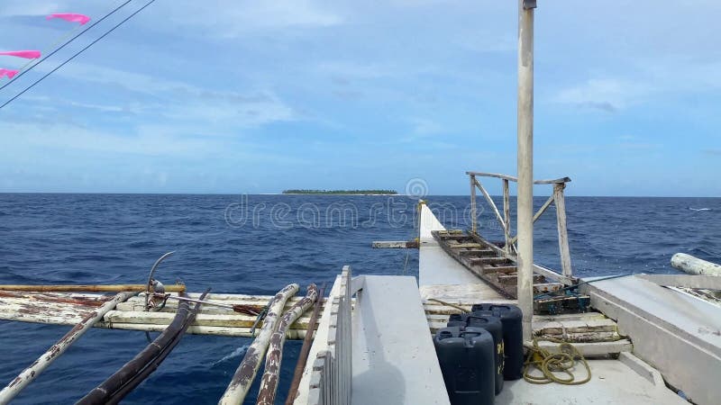 A Wooden Boat Rushes Across the Ocean Bouncing on Big Waves Stock ...