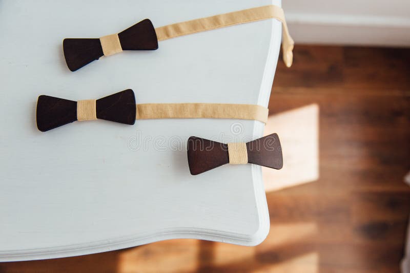 Wooden Bow Ties on a Ivory Table Stock Photo - Image of elegant, denim ...