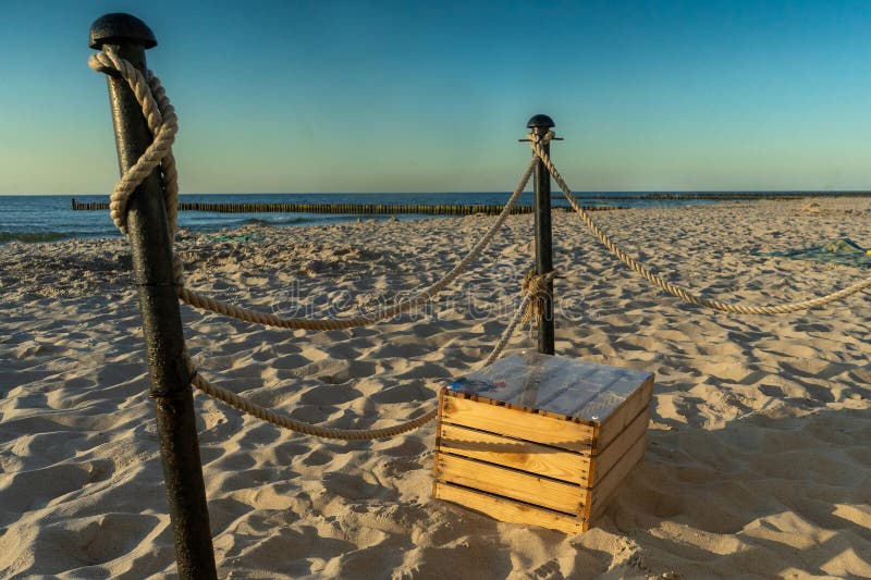 A wooden box at beach stock photo. Image of adventure - 337546502