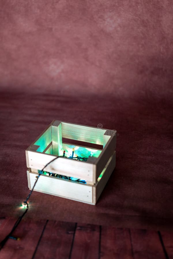 Wooden Box with Garland on Bold Background Stock Photo - Image of ...