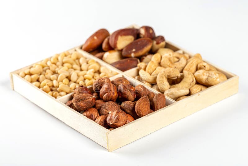 Wooden Box with a Selection of Different Types of Delicious Nuts Stock ...