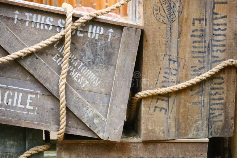 Wooden Box with Text Written on Them and Ropes Around Them Stock Photo ...