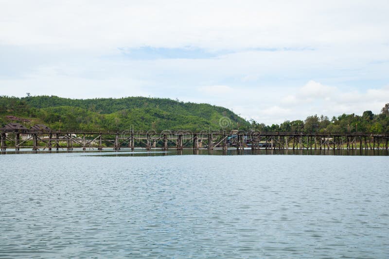 Wooden Bridge Across the River. Stock Photo - Image of shadow, outside ...