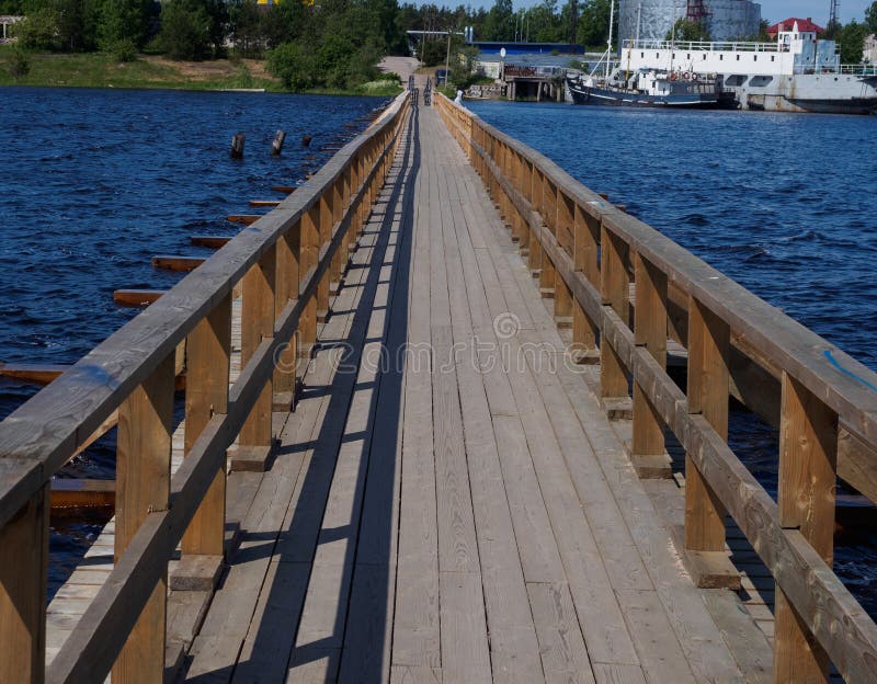 A Wooden Bridge Across the River Stock Image - Image of color, rural ...