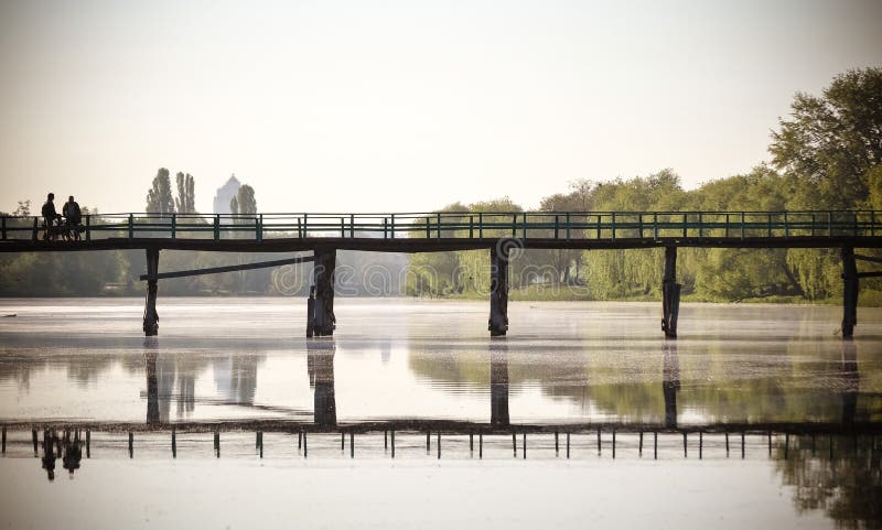 Wooden Bridge Across the River Stock Photo - Image of filter, river ...