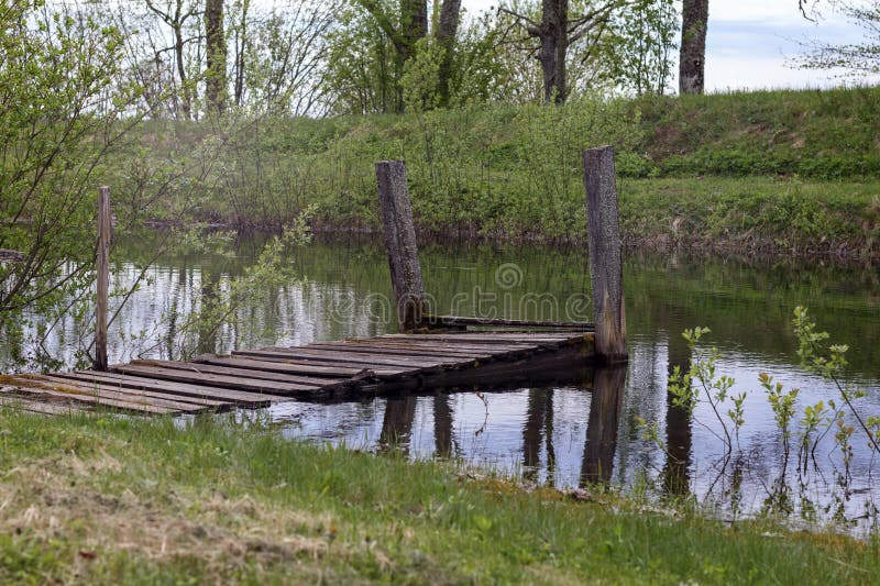 .the Wooden Bridge in the Backyard Pond is Submerged in Water Stock ...