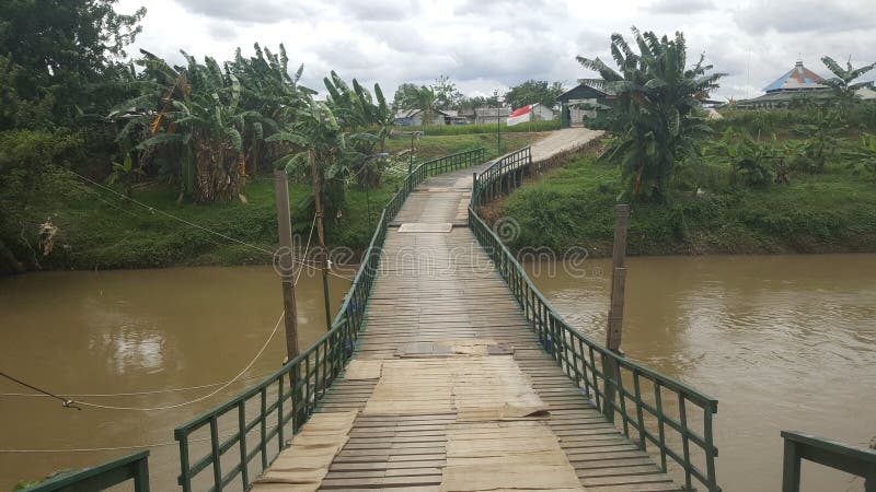 Wooden Bridge in Countryside Stock Photo - Image of countryside, river ...