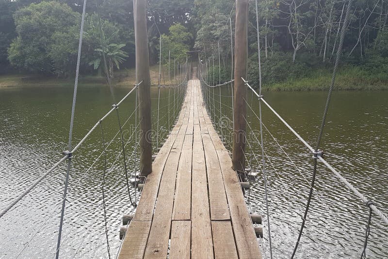 Wooden Bridge Crossing a Large Lake Stock Photo - Image of travel ...