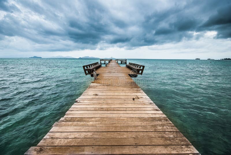Wooden Bridge Extending into the Sea Stock Image - Image of tropical ...