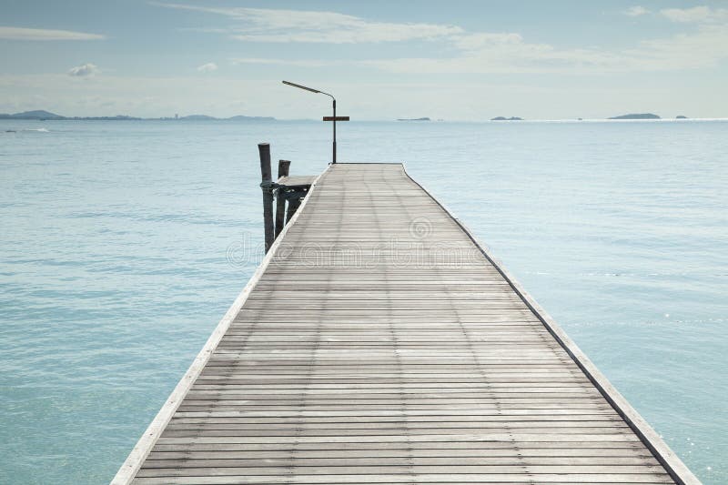 A Wooden Bridge Extending into the Sea Stock Image - Image of abstract ...