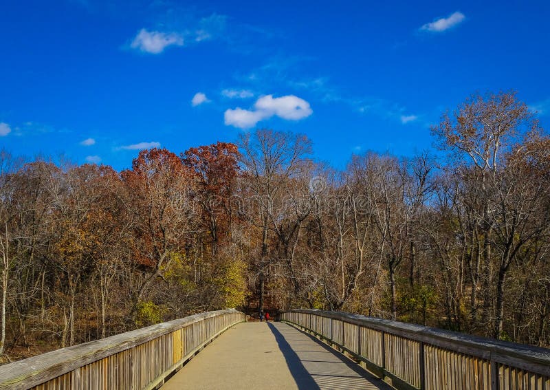 Wooden bridge in the fall stock image. Image of cityscape - 81751939