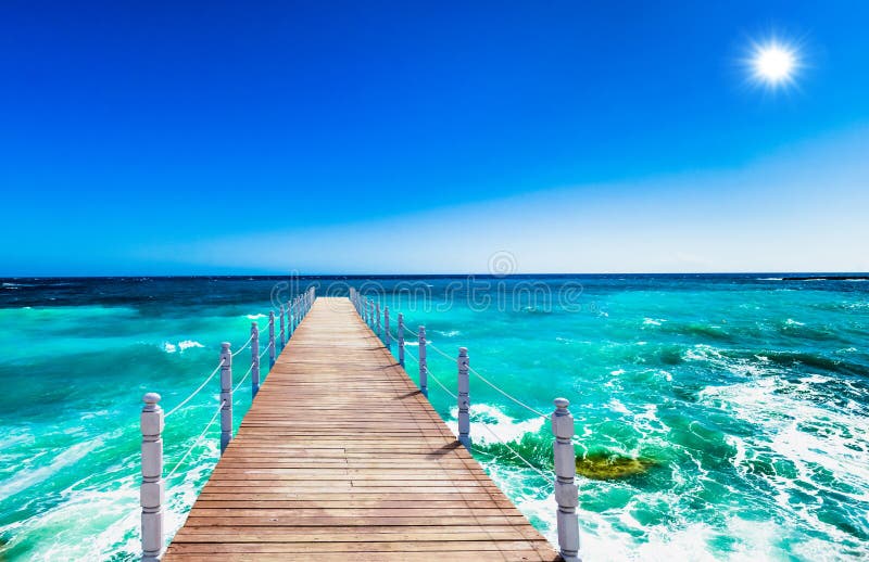 Wooden Bridge Juts Out into of the Sea Stock Photo - Image of peaceful ...