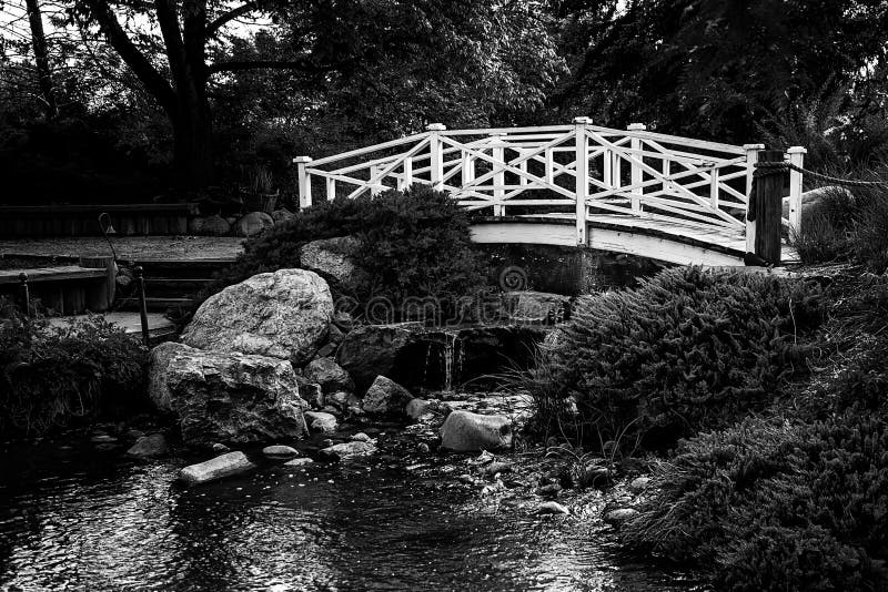 Wooden Bridge over a Brook stock photo. Image of stream - 122610406