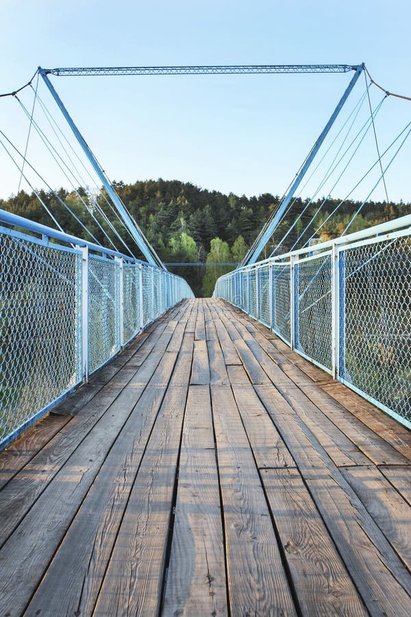Wooden Bridge Over Deep River Stock Image - Image of hills, landscape ...