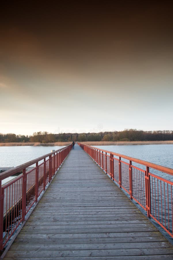 Wooden Bridge Over the Lake Stock Image - Image of dawn, sunrise: 77055069