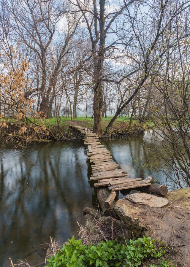 Wooden Bridge Over the River Stock Photo - Image of footbridge, gorge ...