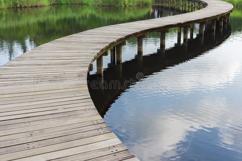 Wooden bridge over river stock image. Image of marsh - 96226029