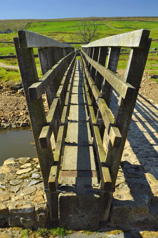Wooden Bridge Over Stream in Countryside Stock Photo - Image of english ...