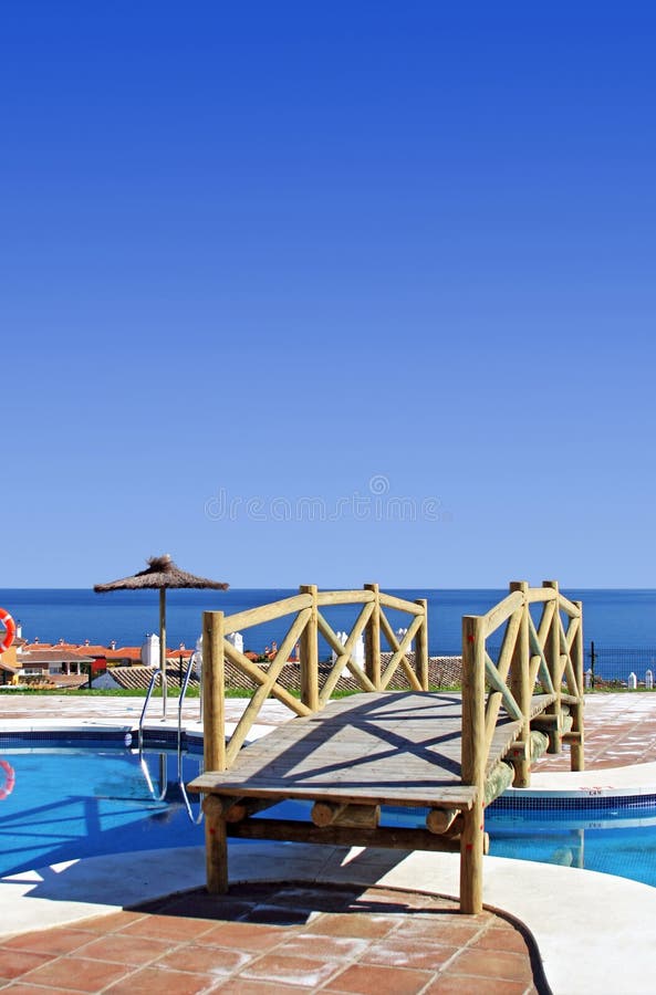 Wooden Bridge Over Swimming Pool in Spanish Urbanisation Stock Photo ...