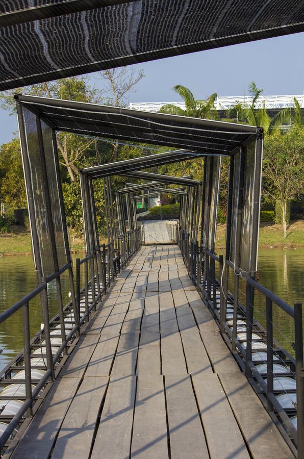 Wooden Bridge Over the Water Stock Photo - Image of bridge, connection ...