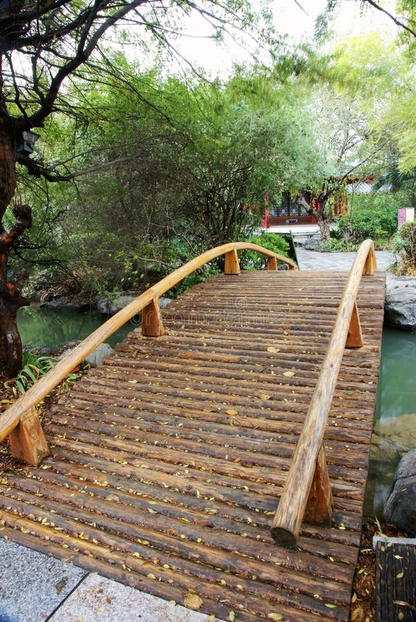 Wooden bridge in park stock image. Image of gardens, path - 17528923