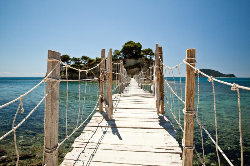 Wooden bridge with ropes stock photo. Image of clouds - 14357800