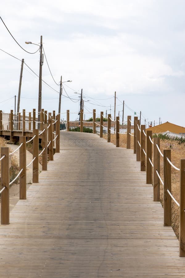 Wooden Bridge through Sand Dunes Stock Photo - Image of fence, tourism ...