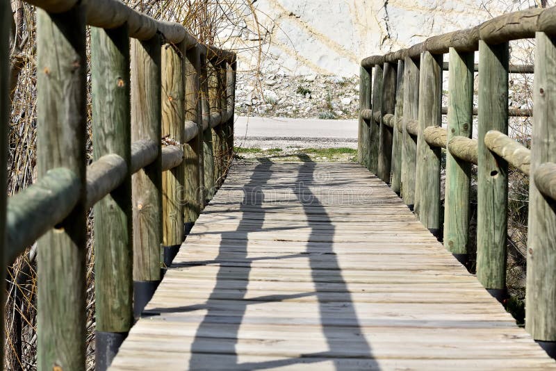 Wooden Bridge with Shadow Lines on the Ground Stock Image - Image of ...