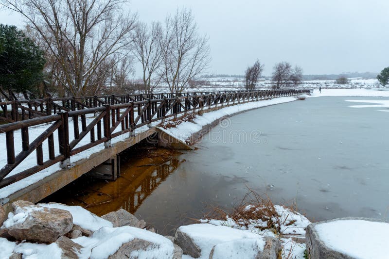 Wooden Bridge Under the Snow in Winter Stock Photo - Image of white ...