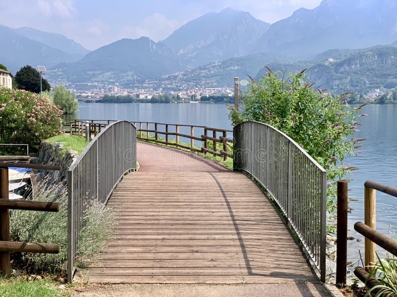 Wooden bridge on walk path stock photo. Image of cityview - 153721834