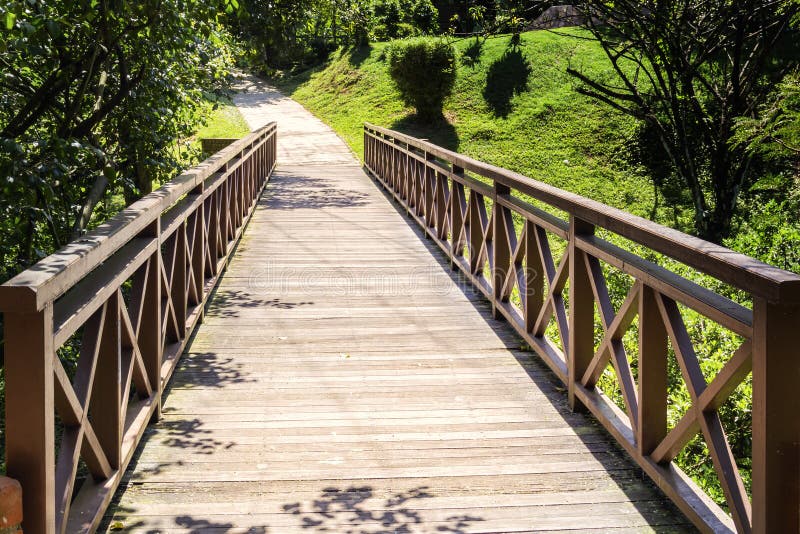 Wooden Bridge on a Walking Path in a City Park Stock Image - Image of ...