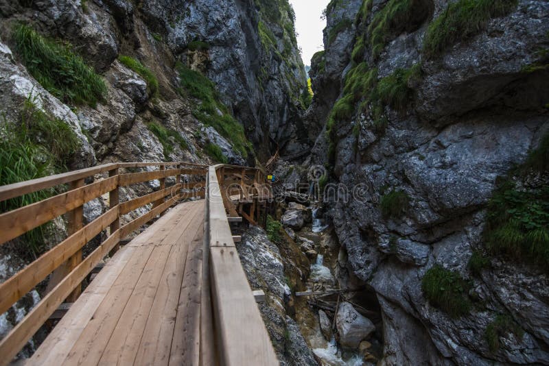 Wooden Bridge with Waterfalls in a Gorge Stock Photo - Image of beauty ...