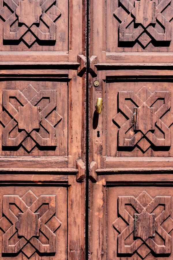 Wooden Brown Doors with Square Patterns and Metal Handle. Stock Photo ...