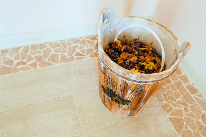 Wooden Bucket in a corner stock photo. Image of dried - 70950150