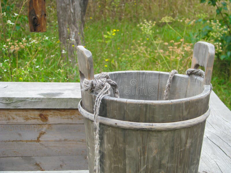 Wooden Bucket on the Old Well Stock Photo - Image of people, history ...