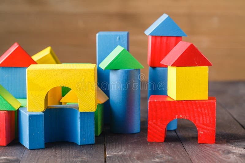 Wooden Building Blocks On A Black Stock Photo - Image: 70080196