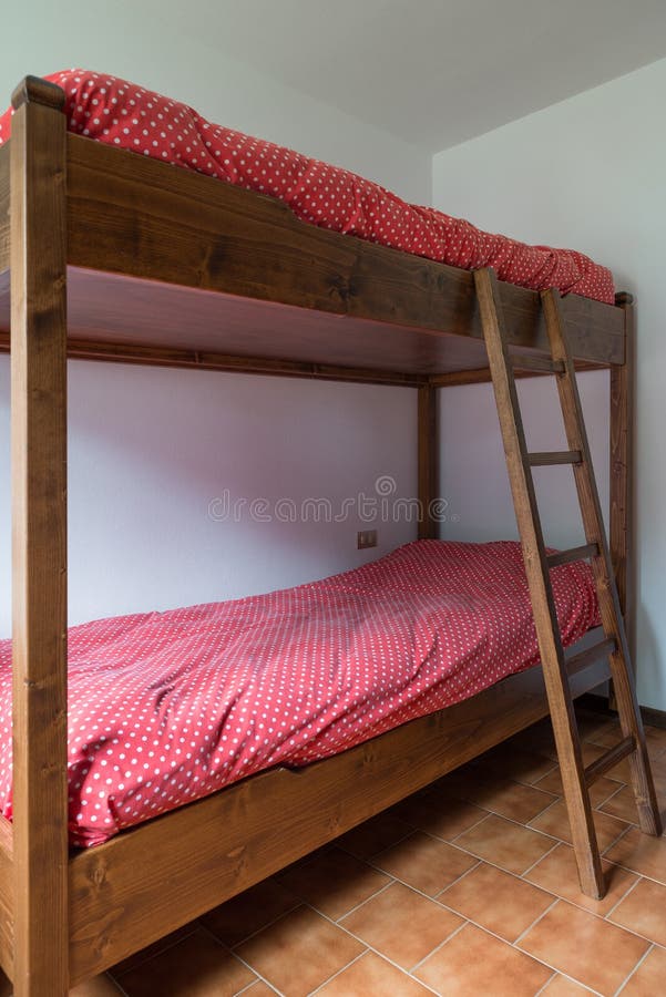 Wooden Bunk Bed with Red Blankets Stock Image - Image of handcrafted ...