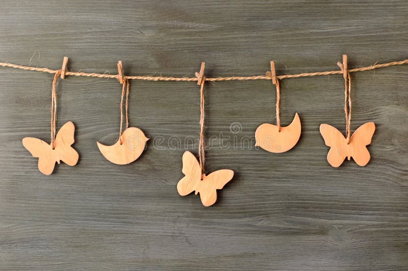 Wooden Butterflies and Birds on a String Stock Image - Image of ...