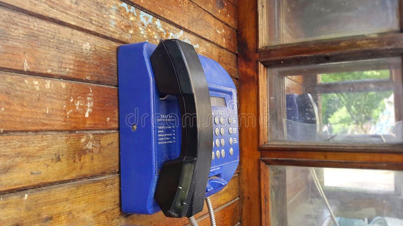 Wooden Call Box with Blue Telephone Stock Photo - Image of coin ...