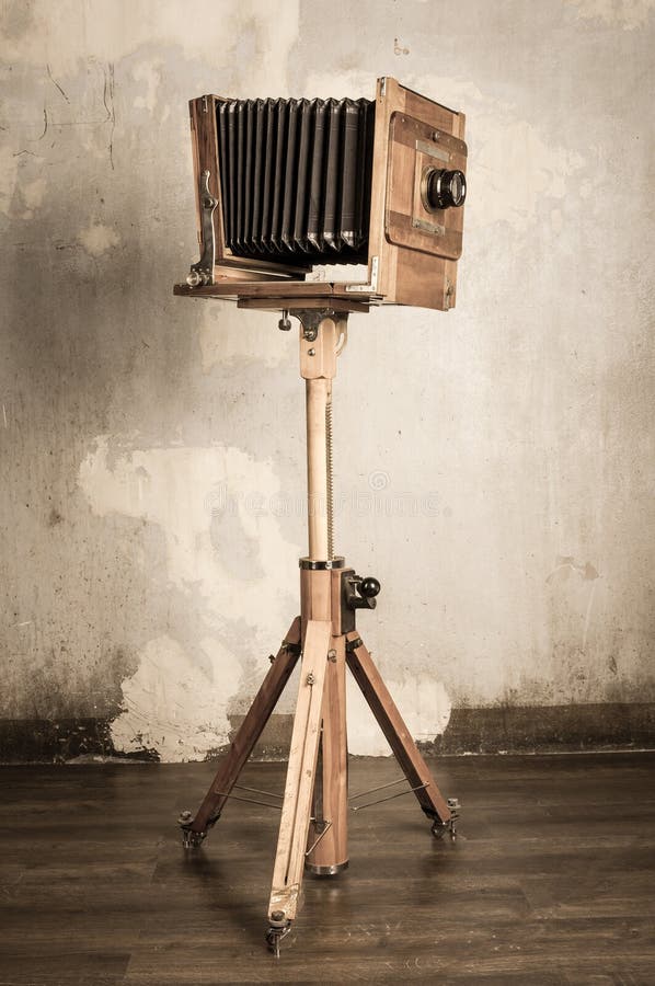 Wooden camera on tripod stock photo. Image of antique - 86468172