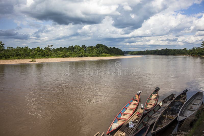 Wooden canoe in river port stock image. Image of napo - 69969317