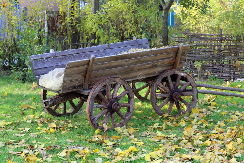 Wooden carriage in garden stock image. Image of vintage - 34507825