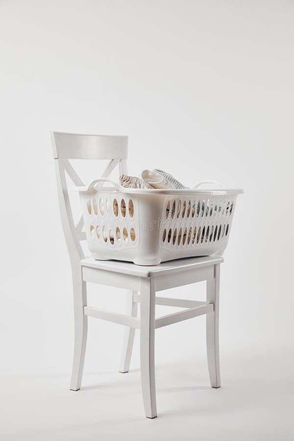 Wooden Chair with Plastic Laundry Basket Stock Photo - Image of wood ...