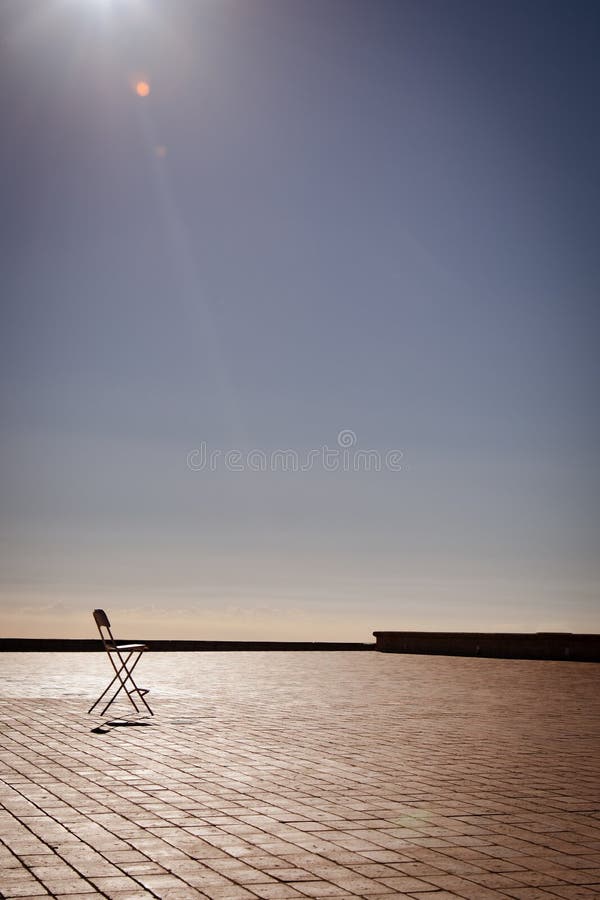A Wooden Chair Standing in the Middle of an Empty Stage. Loneliness ...