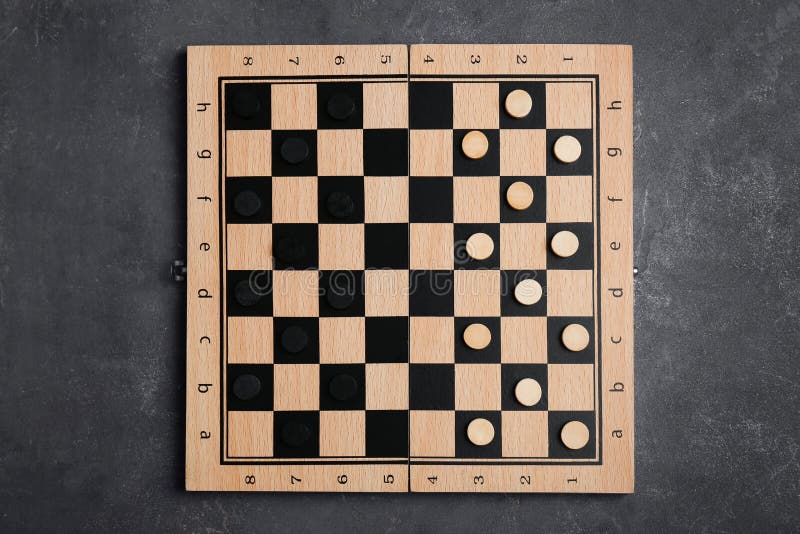 Wooden Checkerboard with Game Pieces on Grey Table, Top View Stock ...